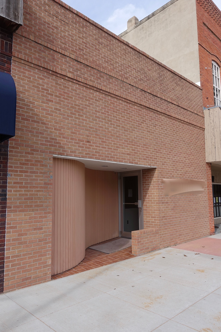 Windowless Facade w/ Recessed Entry | Architectural Observer