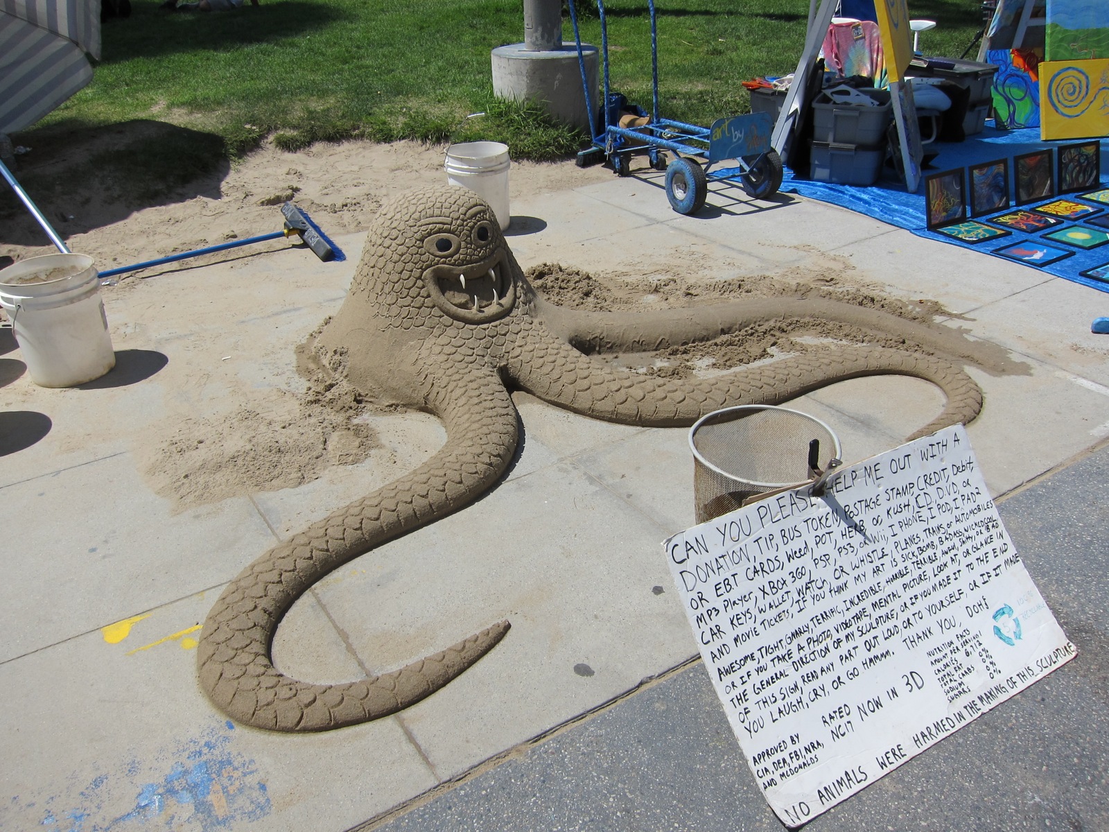 Partially completed octopus sand sculpture on Venice Beach promenade ...