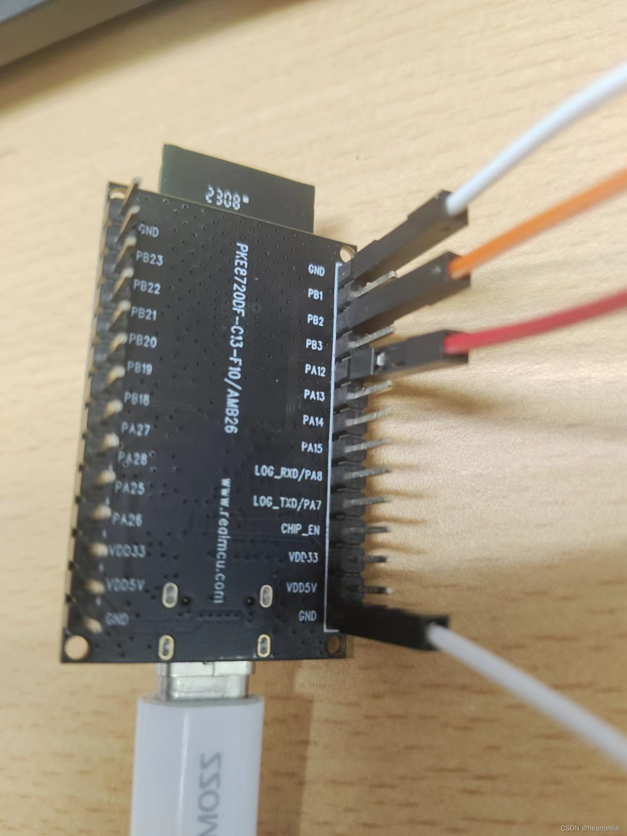 使用PKE8720DF-C13-F10（AMB26）开发板——按键控制LED灯开关 | 编程之家