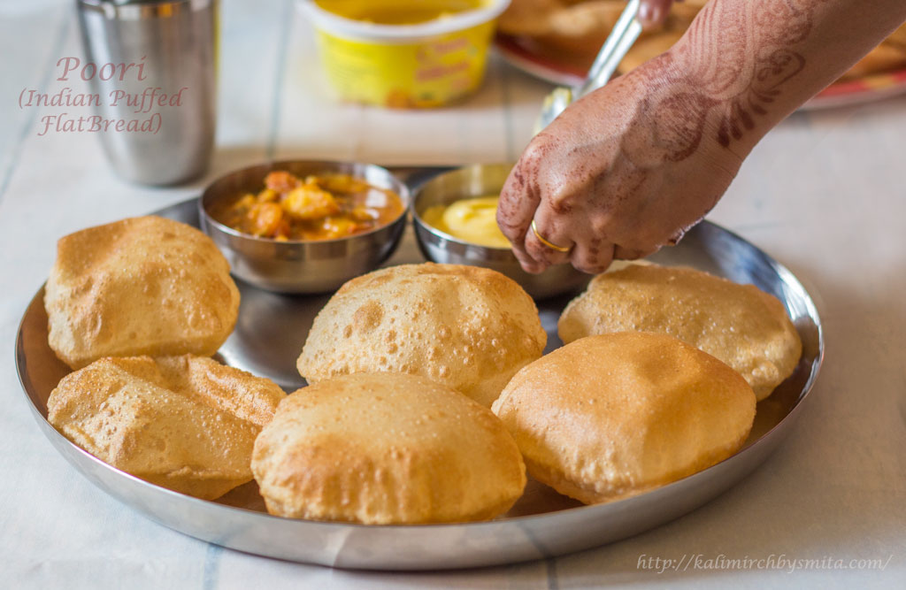Poori recipe-पूरी-How to make soft and puffed Pooris - Kali Mirch - by ...