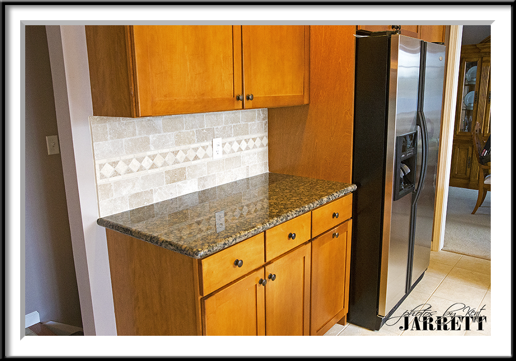 Granite and Tile backsplash | Kent Jarrett Photography