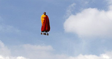 LEVITATING MONK - Weekly World News