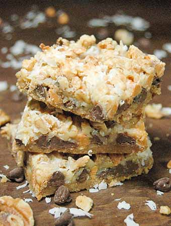 Seven Layer Bars | Magic Cookie Bars - Whisking Up Yum