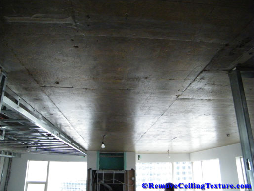 Raw concrete slab transformed into beautiful smooth ceiling in Downtown ...