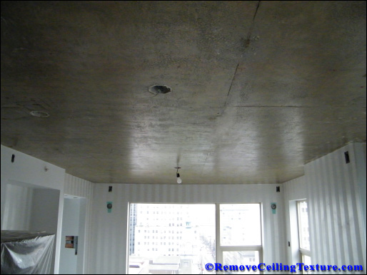 Raw concrete slab transformed into beautiful smooth ceiling in Downtown ...